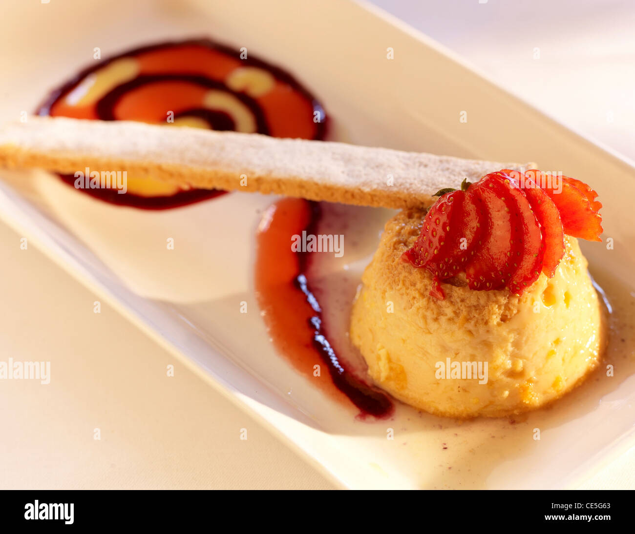 creme brulee with shortbread and strawberry Stock Photo - Alamy