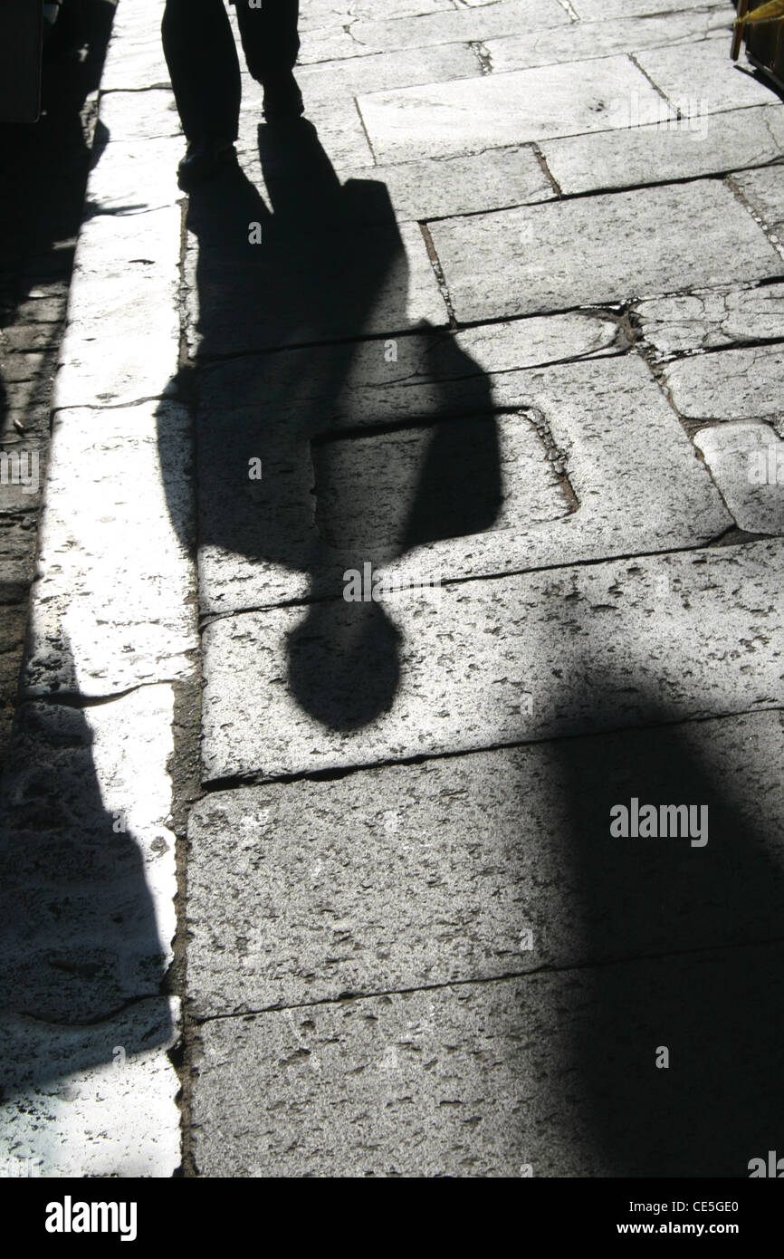 one person walking in empty street road in city town Stock Photo - Alamy
