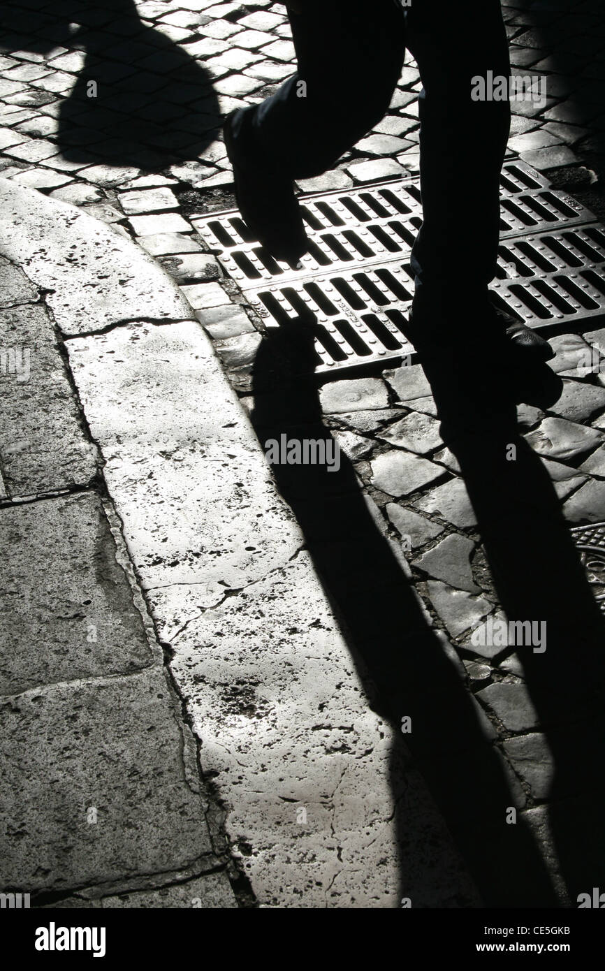 one person walking in empty street road in city town Stock Photo - Alamy