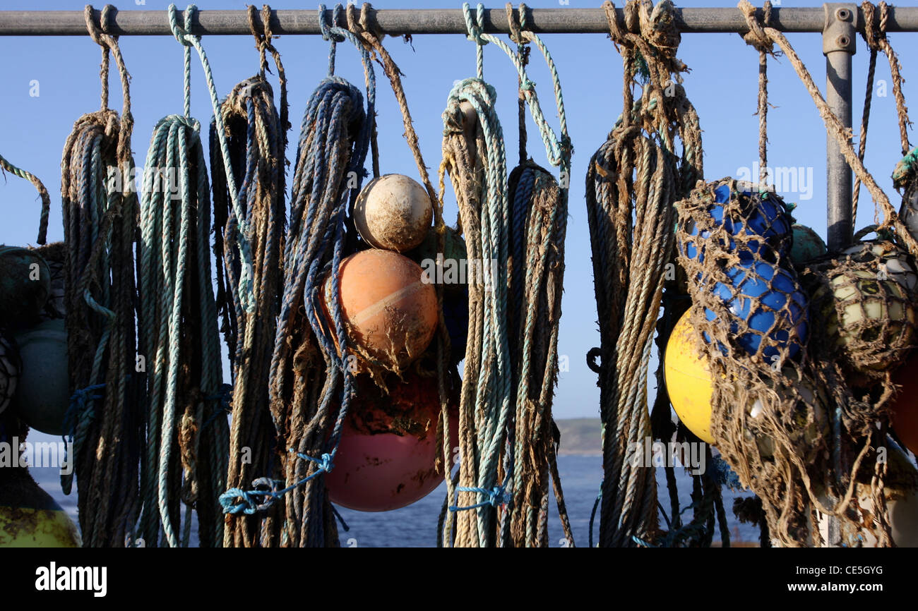 Fishing equipment such as ropes buoys and lobster pots drying out in ...
