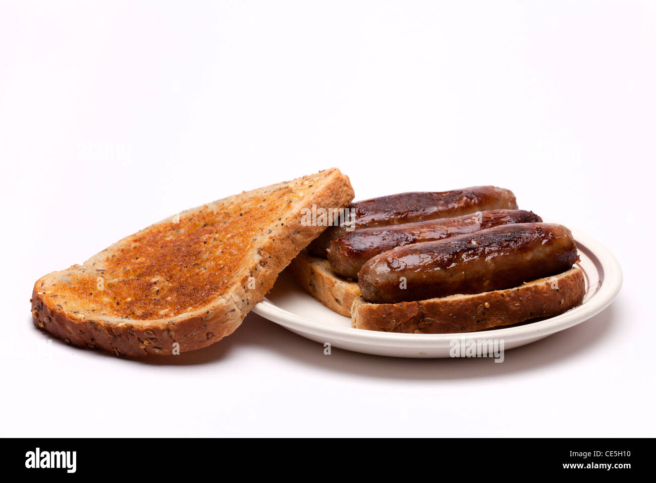 Sausages on toast Stock Photo - Alamy