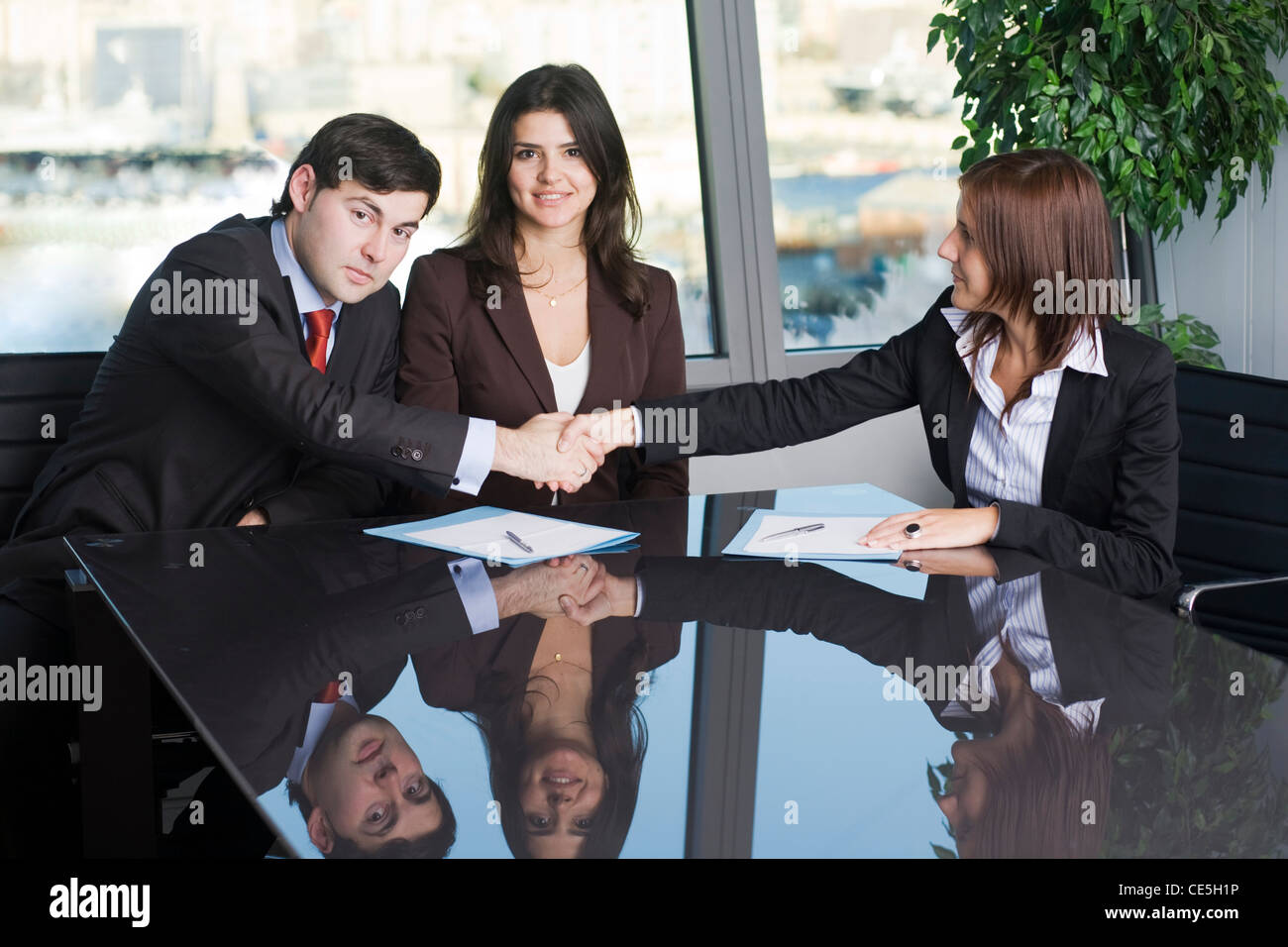 Businesswoman mediating and making business conciliation possible Stock ...
