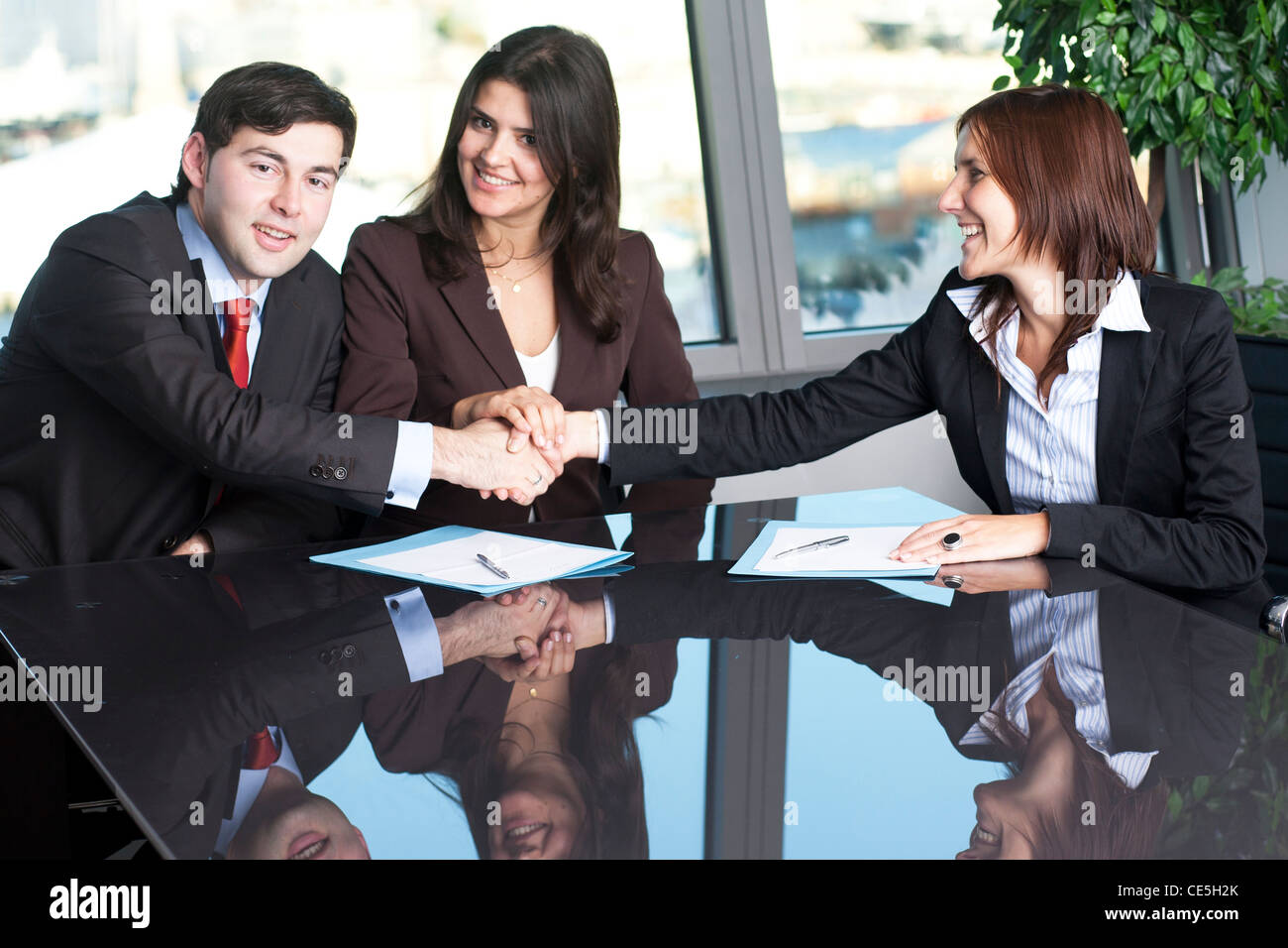 Businesswoman mediating and making business conciliation possible Stock ...