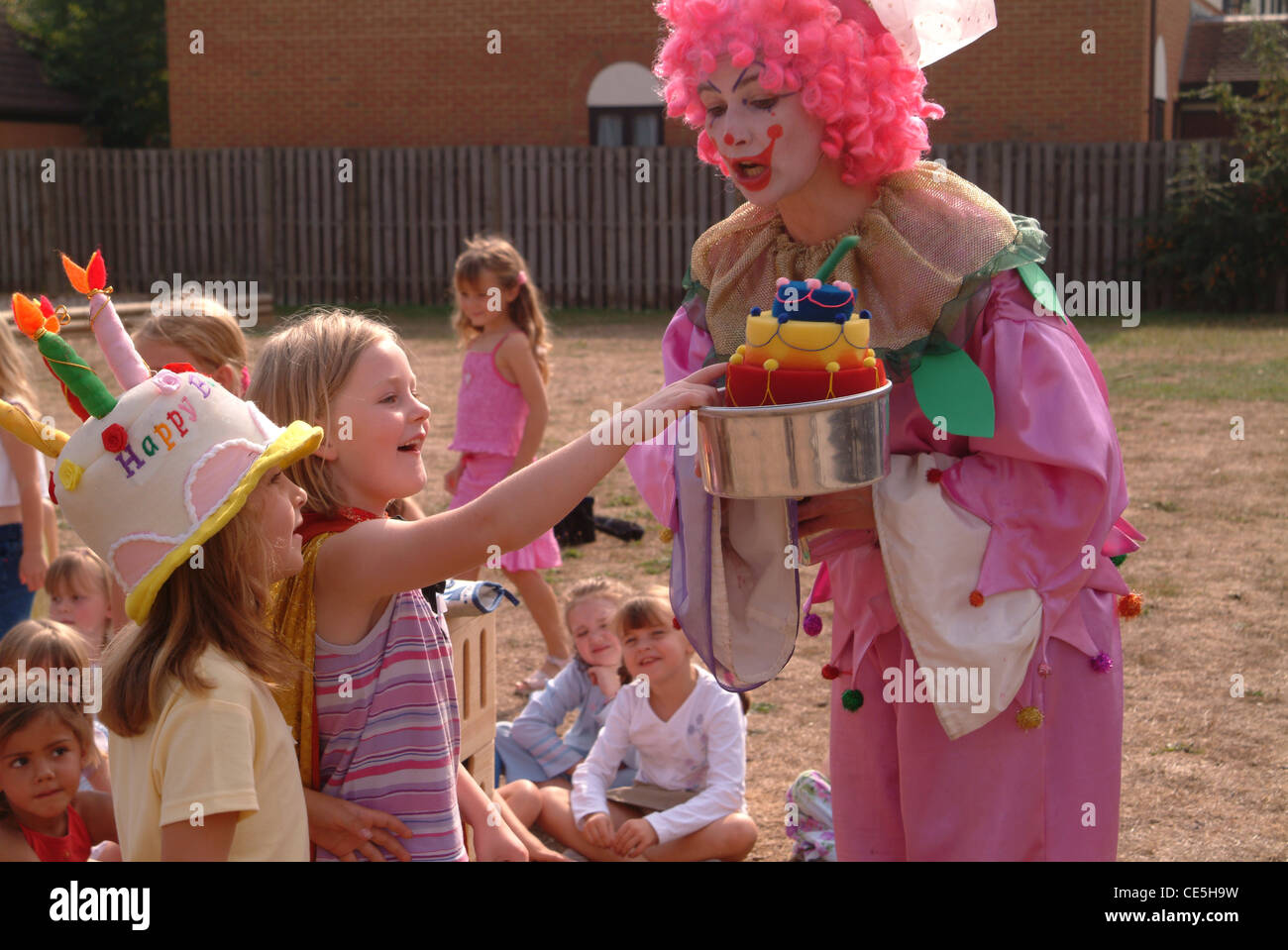 Female clown at a childrens birthday party Stock Photo - Alamy