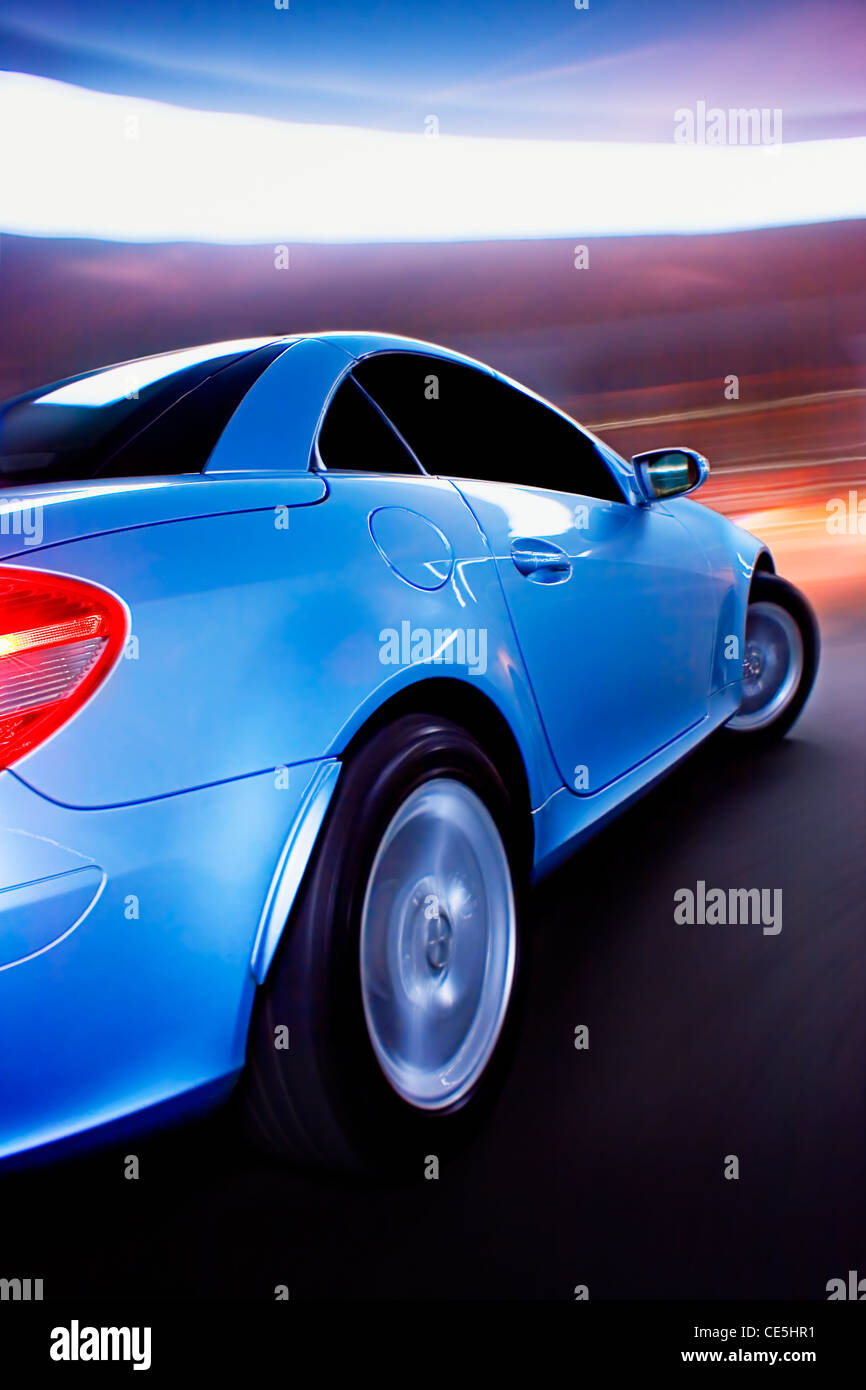 Fast Sports Car with Motion Blur Stock Photo - Alamy