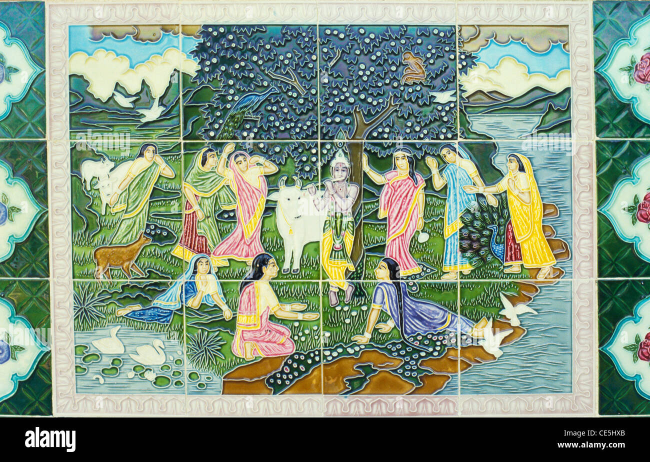 Lord Krishna playing flute and gopis on glazed ceramic tiles India ...