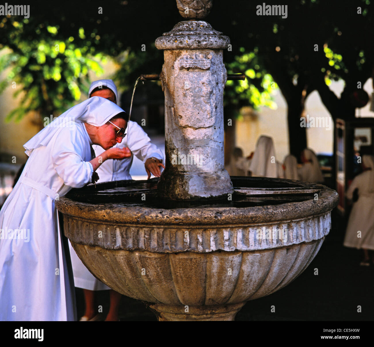 Nun drinking hi-res stock photography and images - Alamy