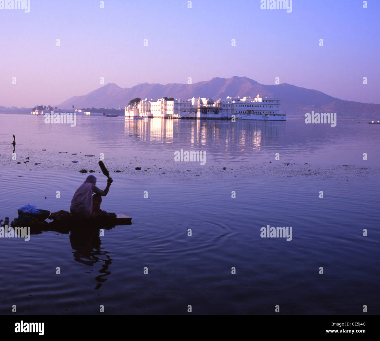 Woman Washing Clothes Lake Pichola Udaipur Rajasthan India Stock