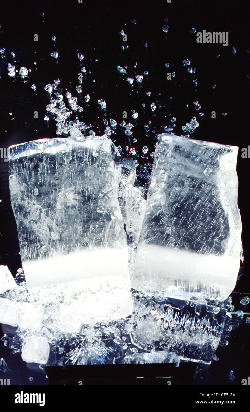 Ice cubes ; cold frozen water Stock Photo - Alamy