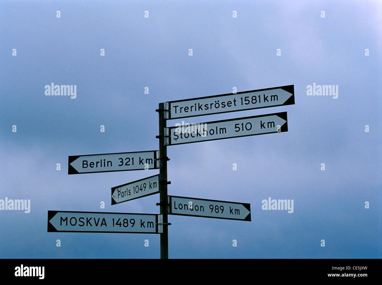 Direction sign Moskva Paris Berlin London Stockholm Treriksroset ...
