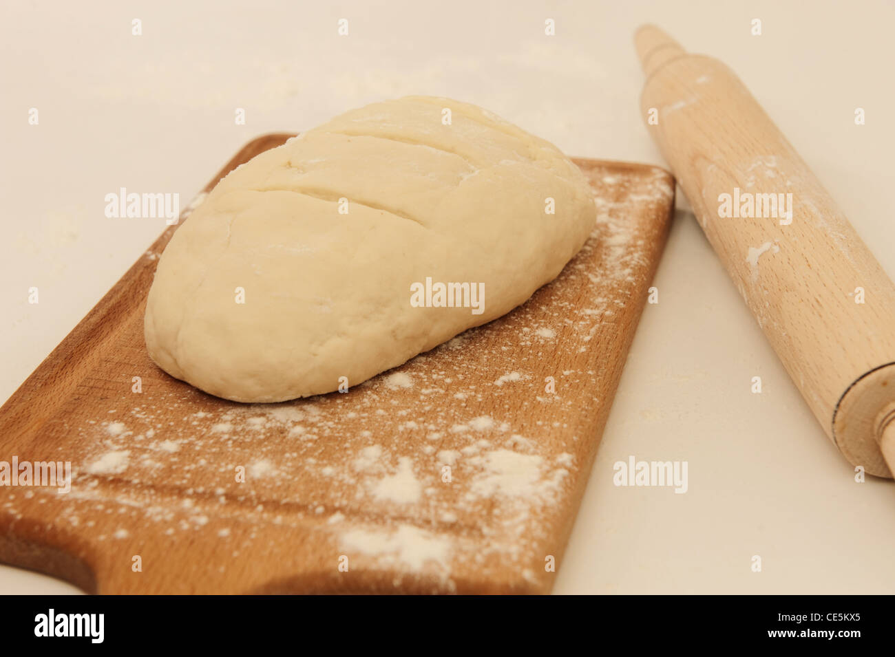 Female cook shaping dough for baking bread Stock Photo - Alamy