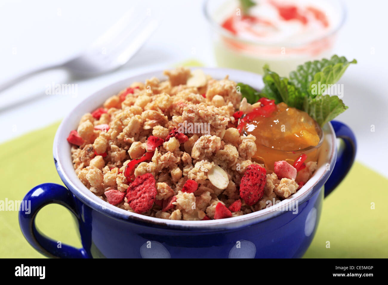 Strawberry granola cereal with jam Stock Photo - Alamy