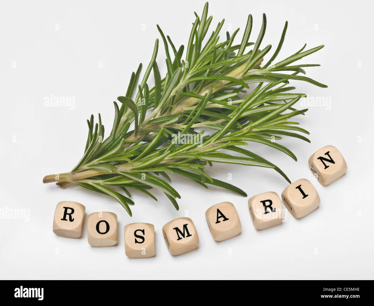 Detail photo of Rosemary Sprigs alongside are cubes which form the word ...