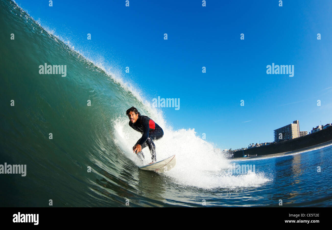 Surfer on Blue Ocean Wave, View from in the Water Stock Photo - Alamy
