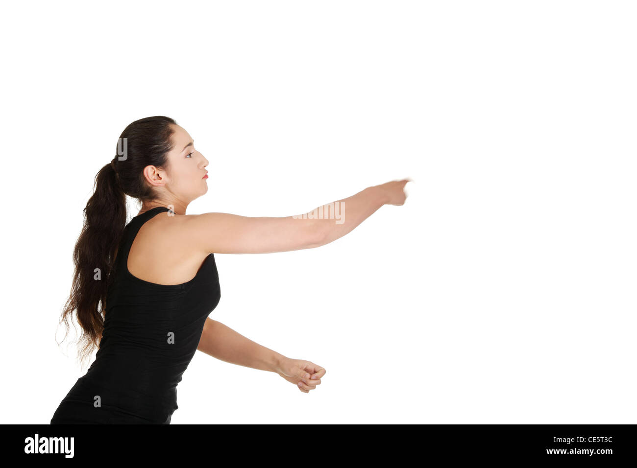 Side view of young woman with fists up isolated on white Stock Photo ...