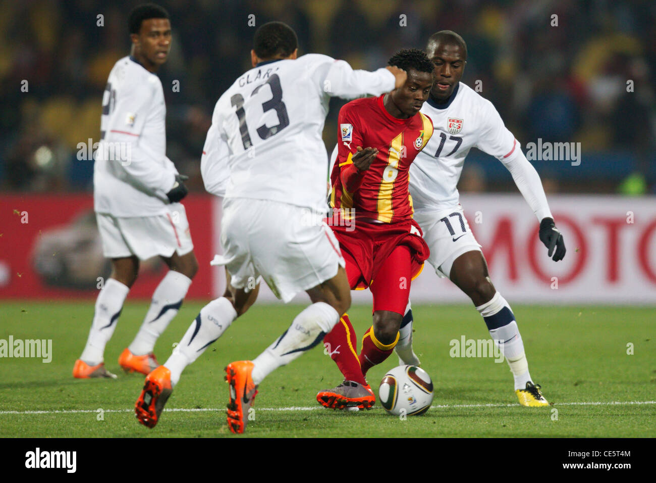 Anthony Annan of Ghana (6) is surrounded by United States defenders ...