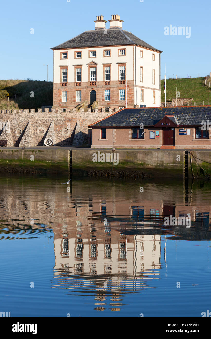 Eyemouth harbour in the Scottish Borders, with Gunsgreen House in the ...