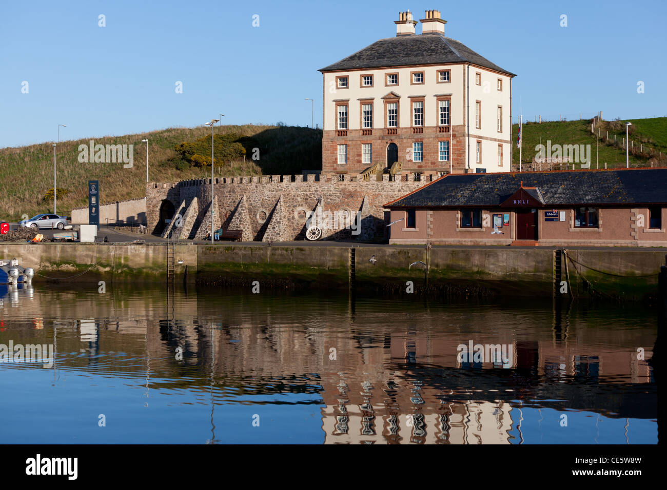 Eyemouth harbour in the Scottish Borders, with Gunsgreen House in the ...