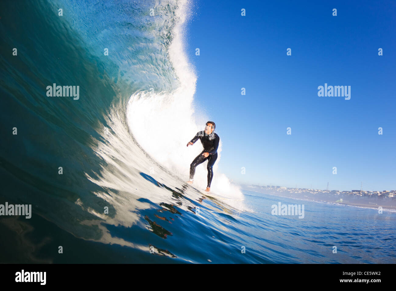 Surfer on Blue Ocean Wave, View from in the Water Stock Photo - Alamy