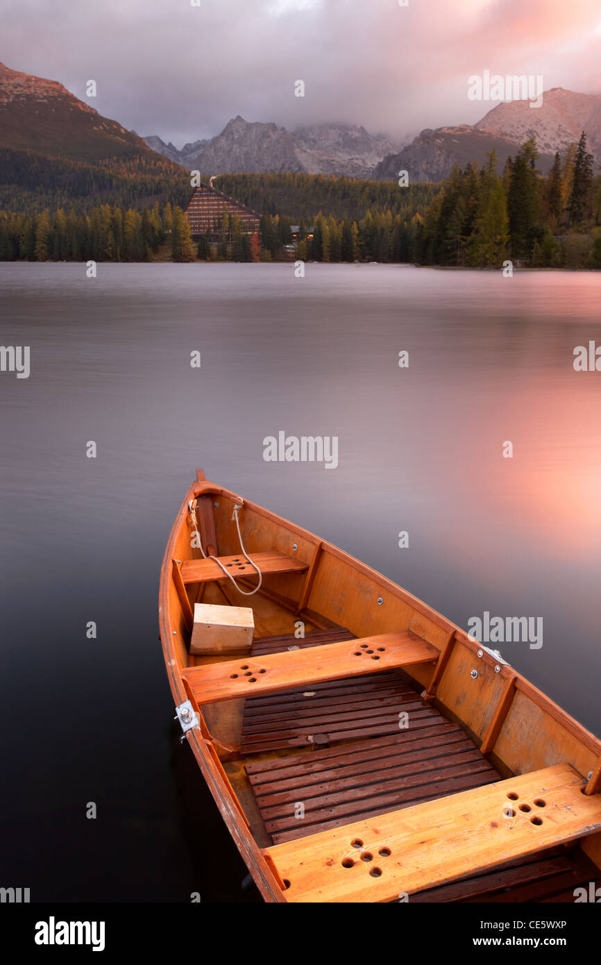 Rowing boat on Strbske Pleso lake at dawn in Slovakia Stock Photo - Alamy