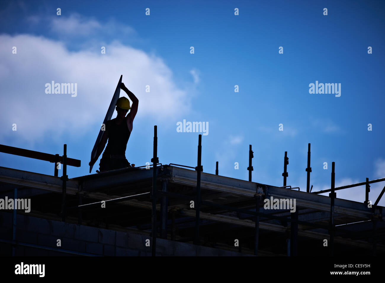 Construction worker on building site Stock Photo - Alamy