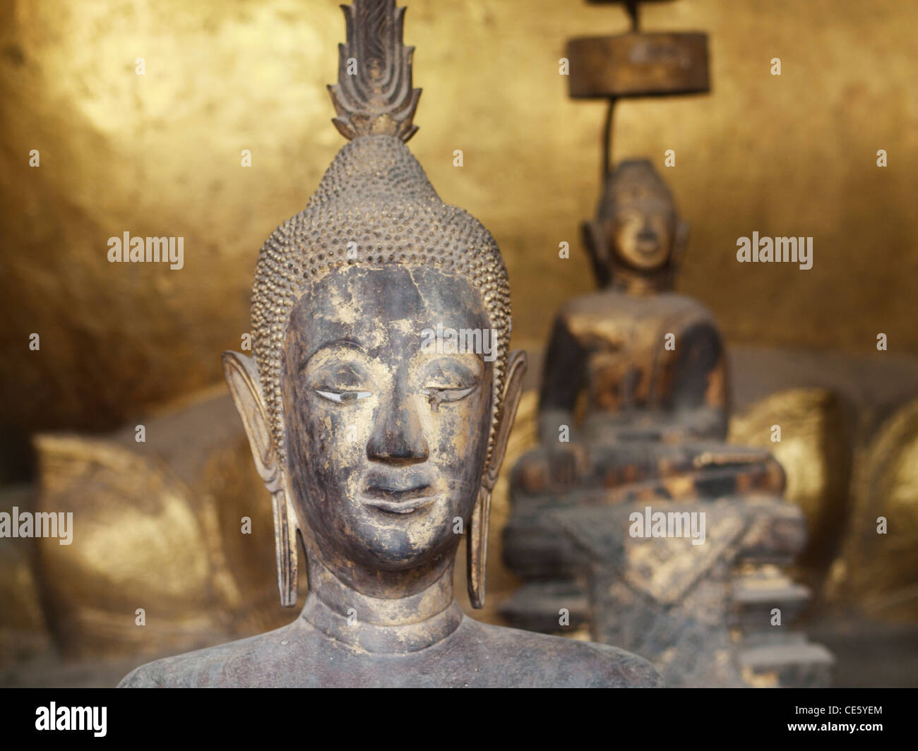 Laos wat temple buddha head face hi-res stock photography and images ...