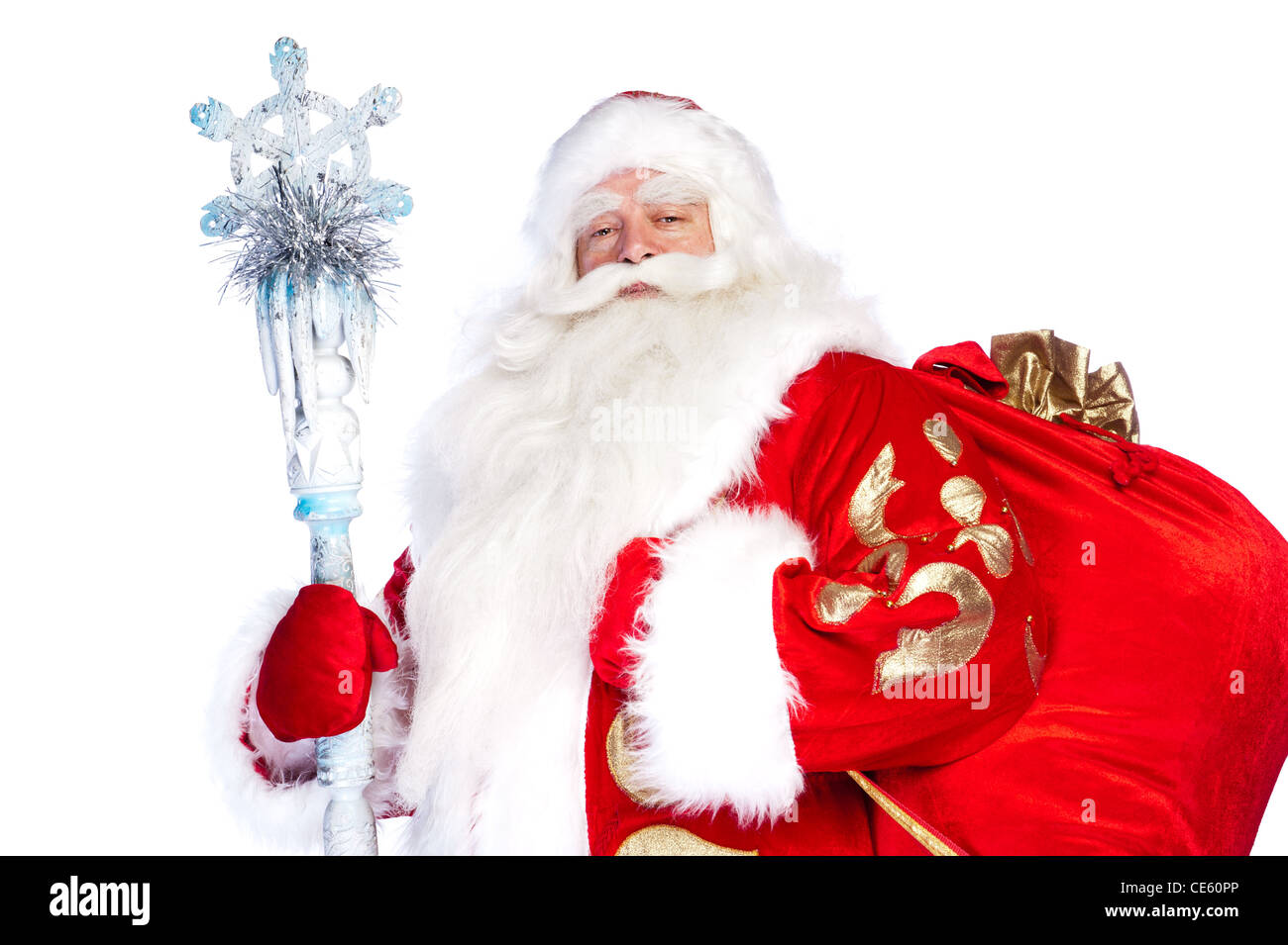 A traditional Christmas Santa Clause with staff isolated on white ...