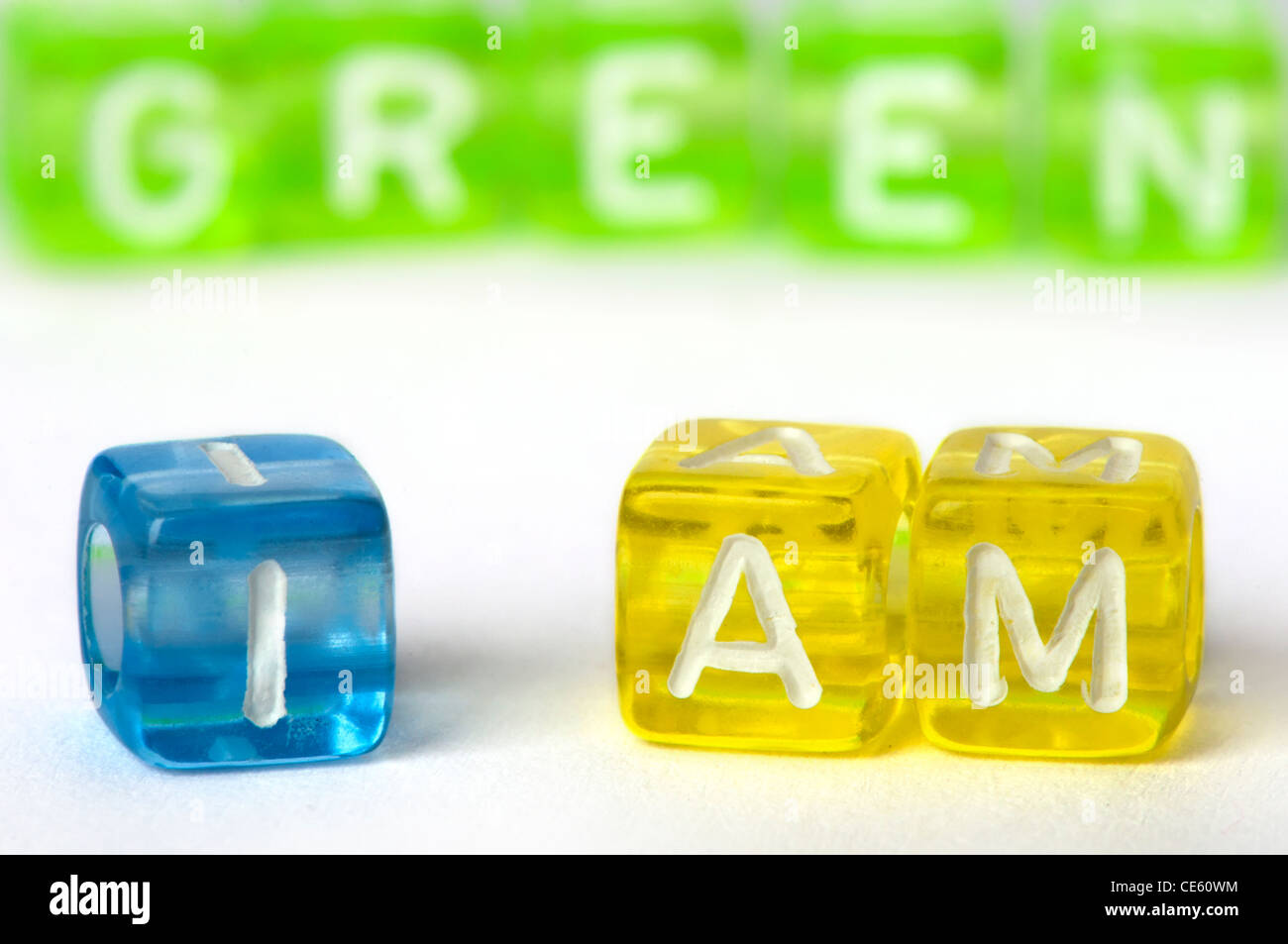 Text I am green on colorful cubes over white Stock Photo - Alamy