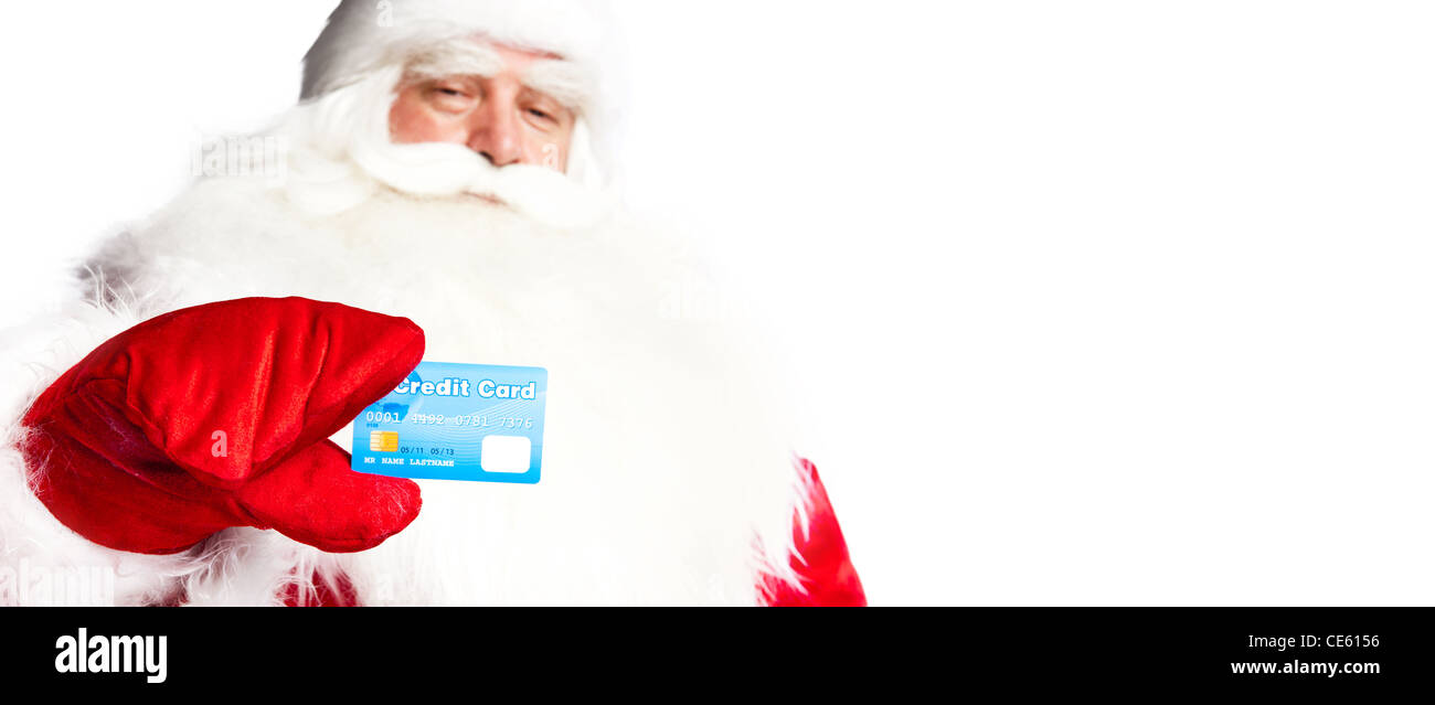 Traditional Santa Claus holding and sowing credit card while giving a ...