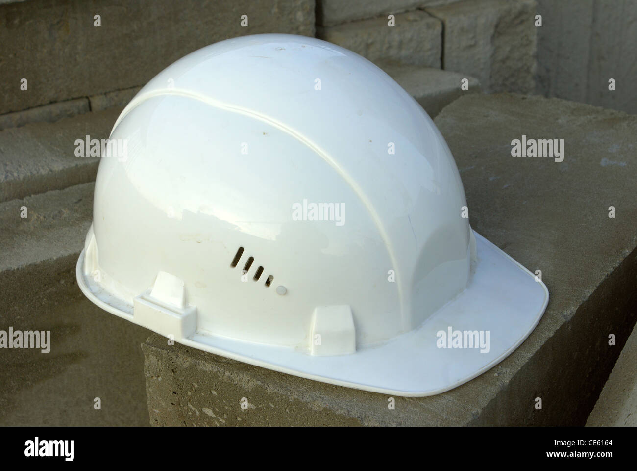 Protective building white helmet Stock Photo - Alamy
