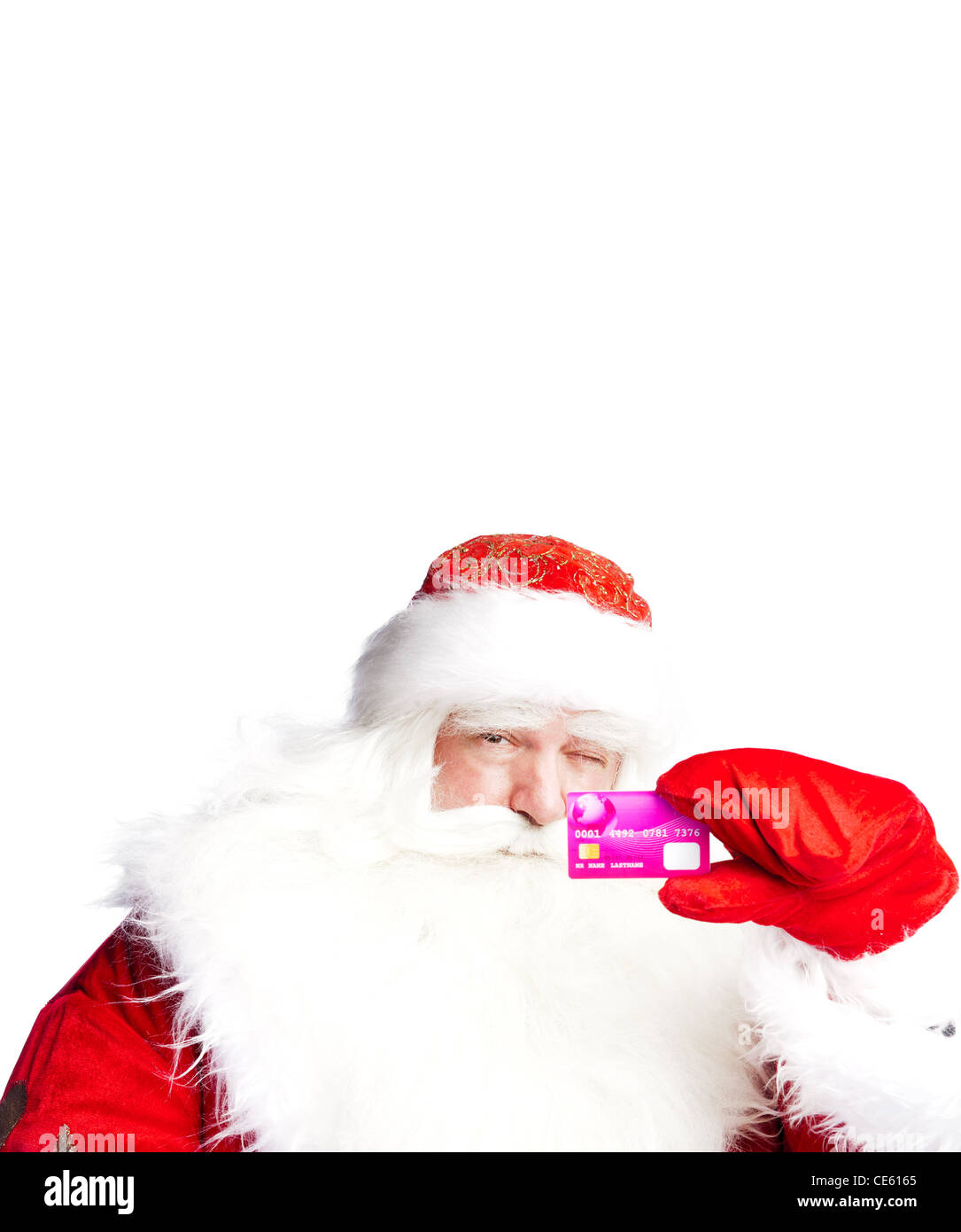 Traditional Santa Claus holding and sowing credit card while giving a ...