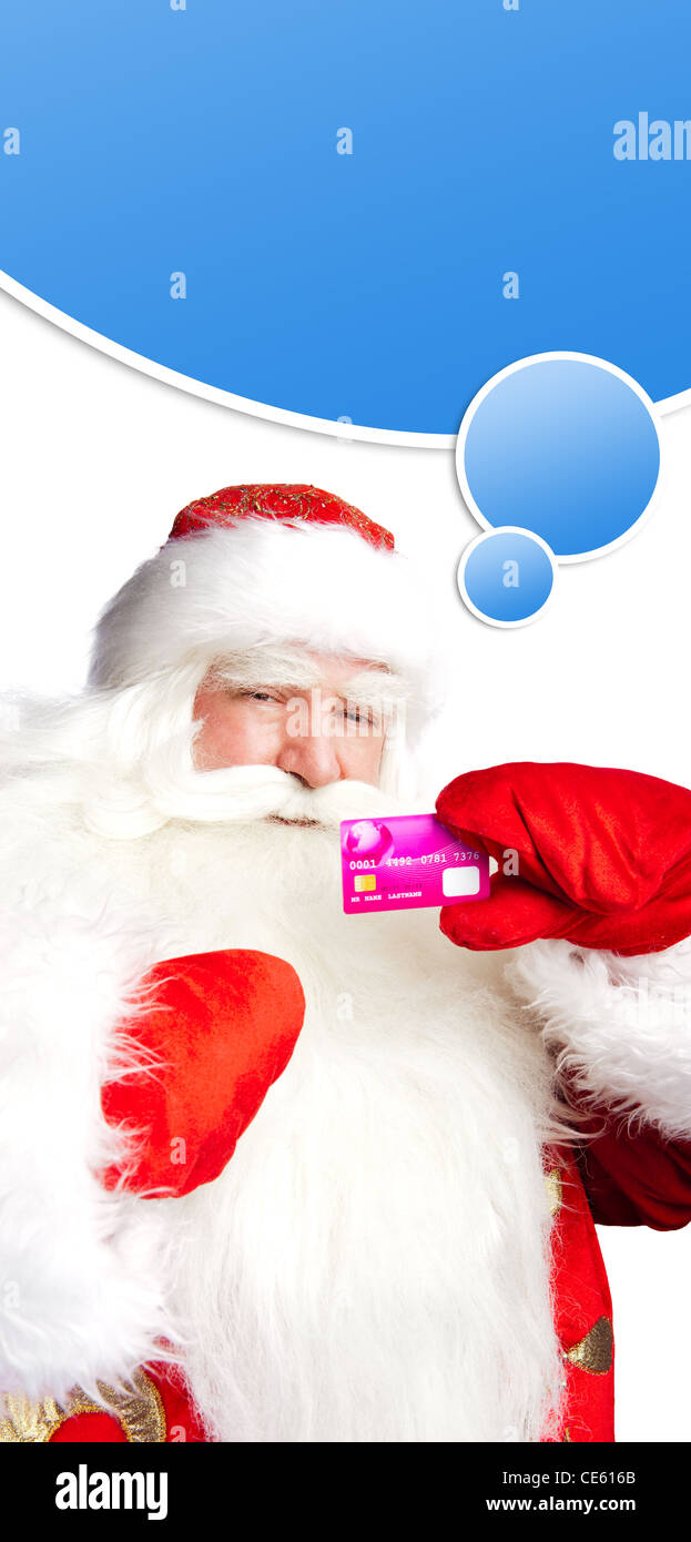 Traditional Santa Claus holding and sowing credit card while giving a ...