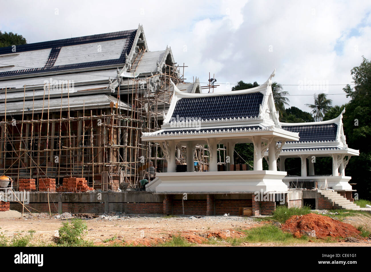 A new and modern Buddhist temple pagoda building is under construction ...