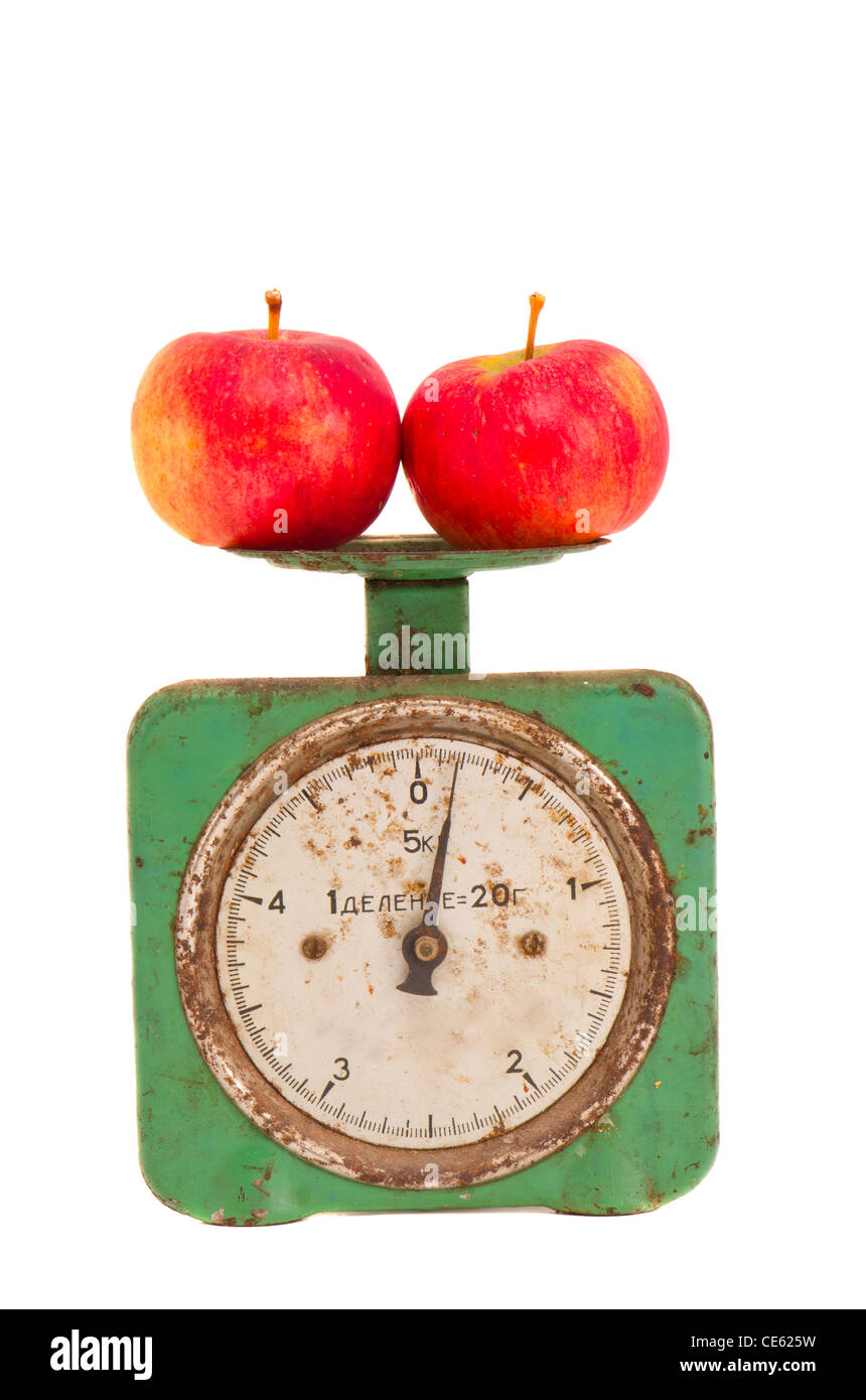 isolated vintage and grunge scale with two apples Stock Photo - Alamy