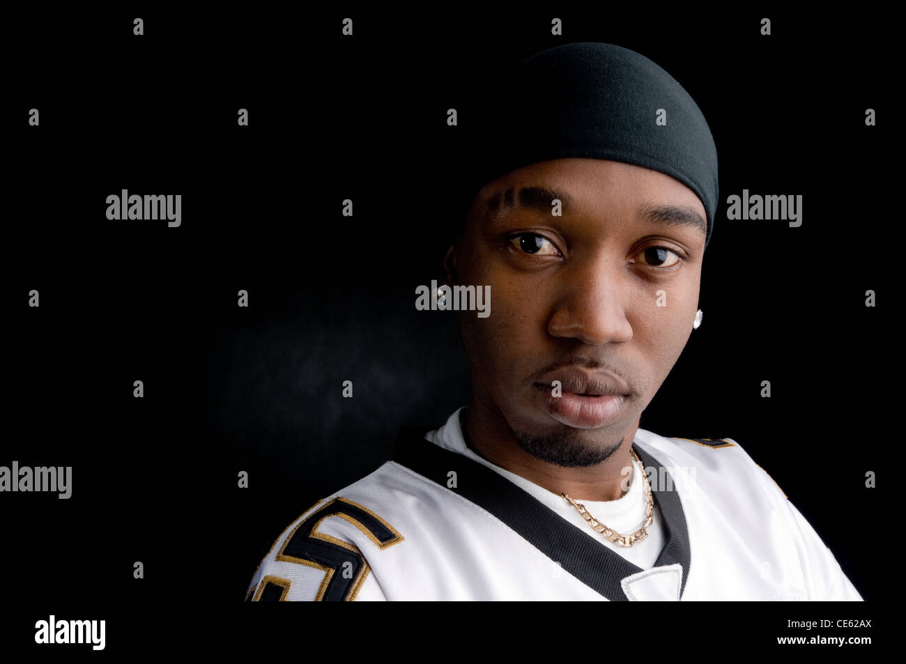 Hip-hop singer and dancer over black background Stock Photo - Alamy