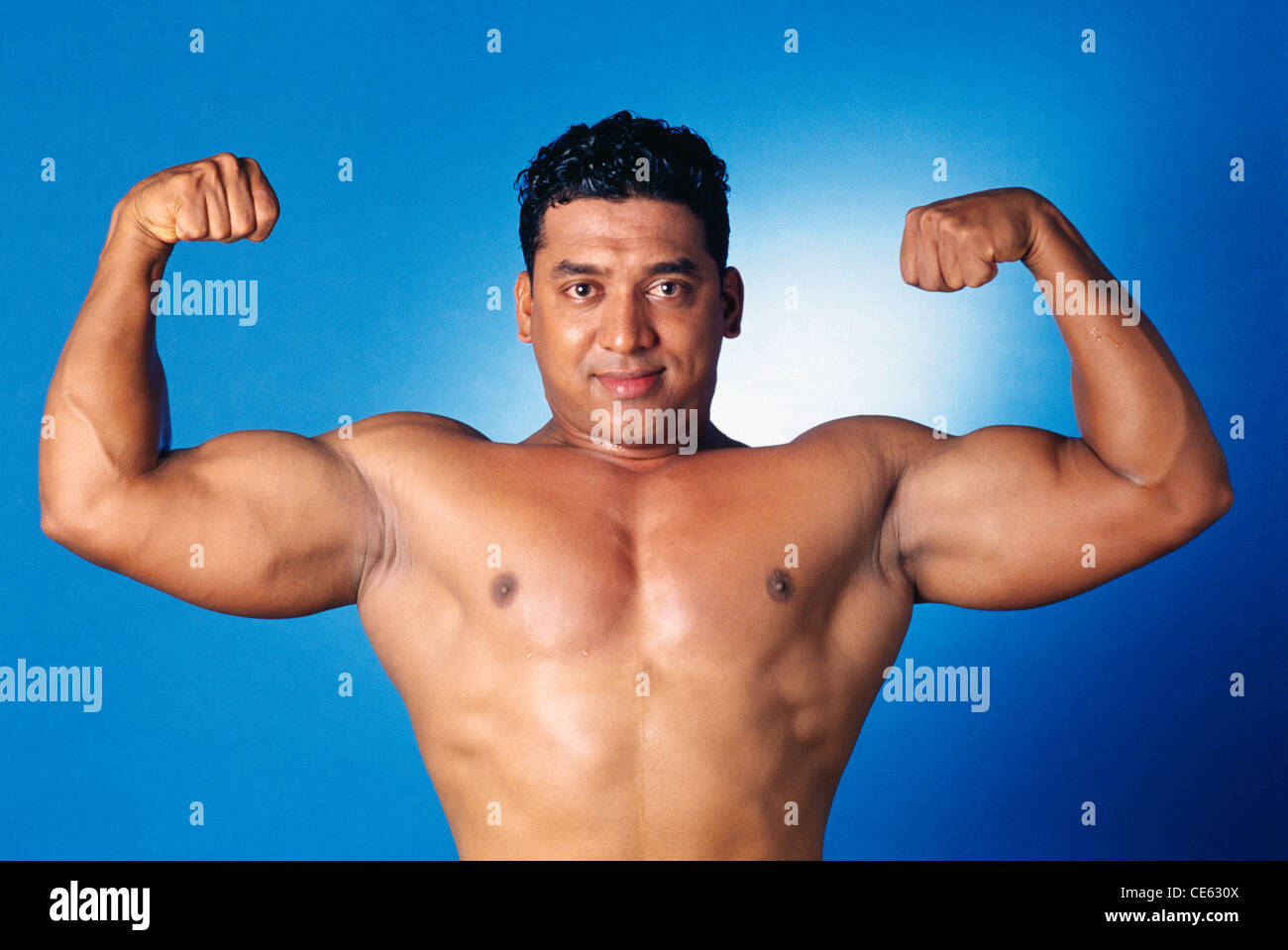 Body builder showing front double biceps - MR#411 - RMM 69570 Stock ...