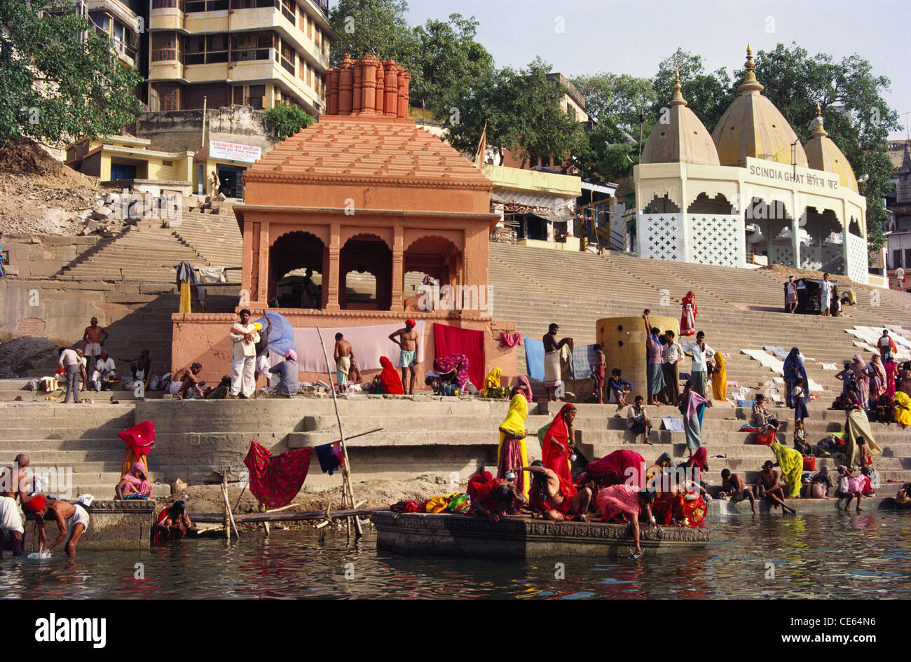 People bathing and praying ; Scindia Ghat ; Ganga river Ganges ...