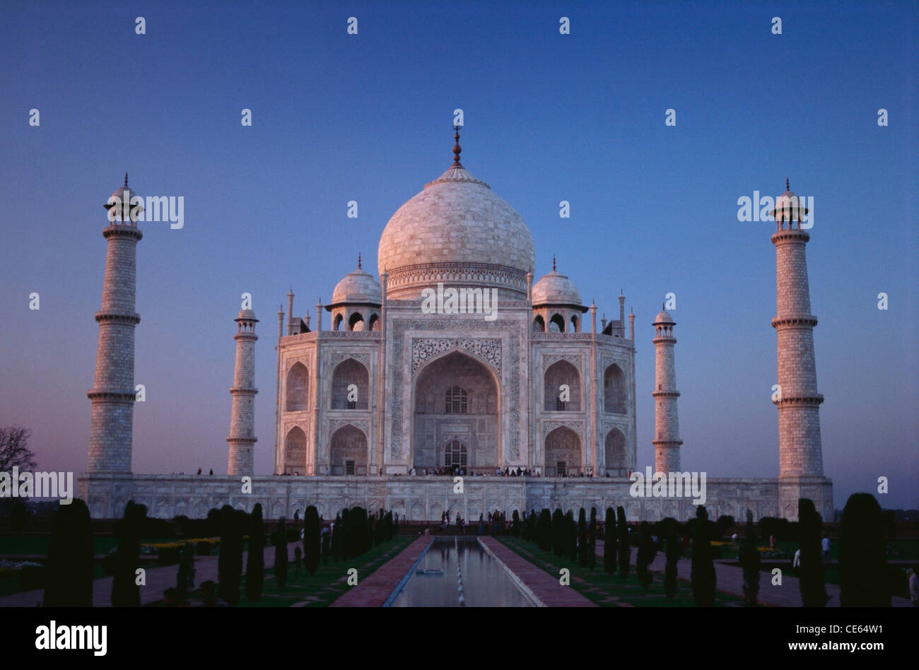 Taj Mahal at dawn ; white marble mausoleum ; Mughal architecture ; Agra ...
