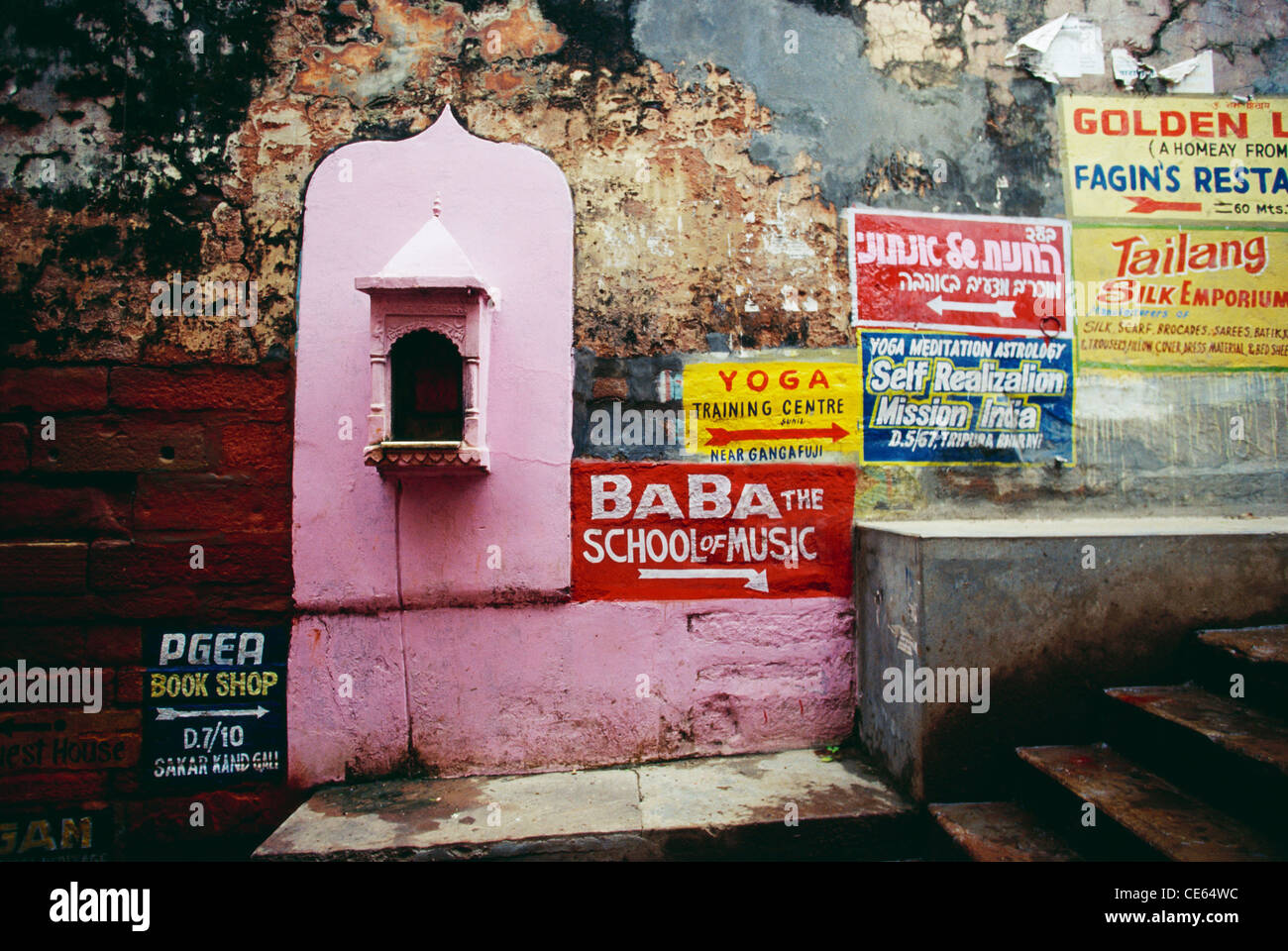 Temple in alcove ; old narrow lanes of Varanasi ; Uttar Pradesh ; India ...