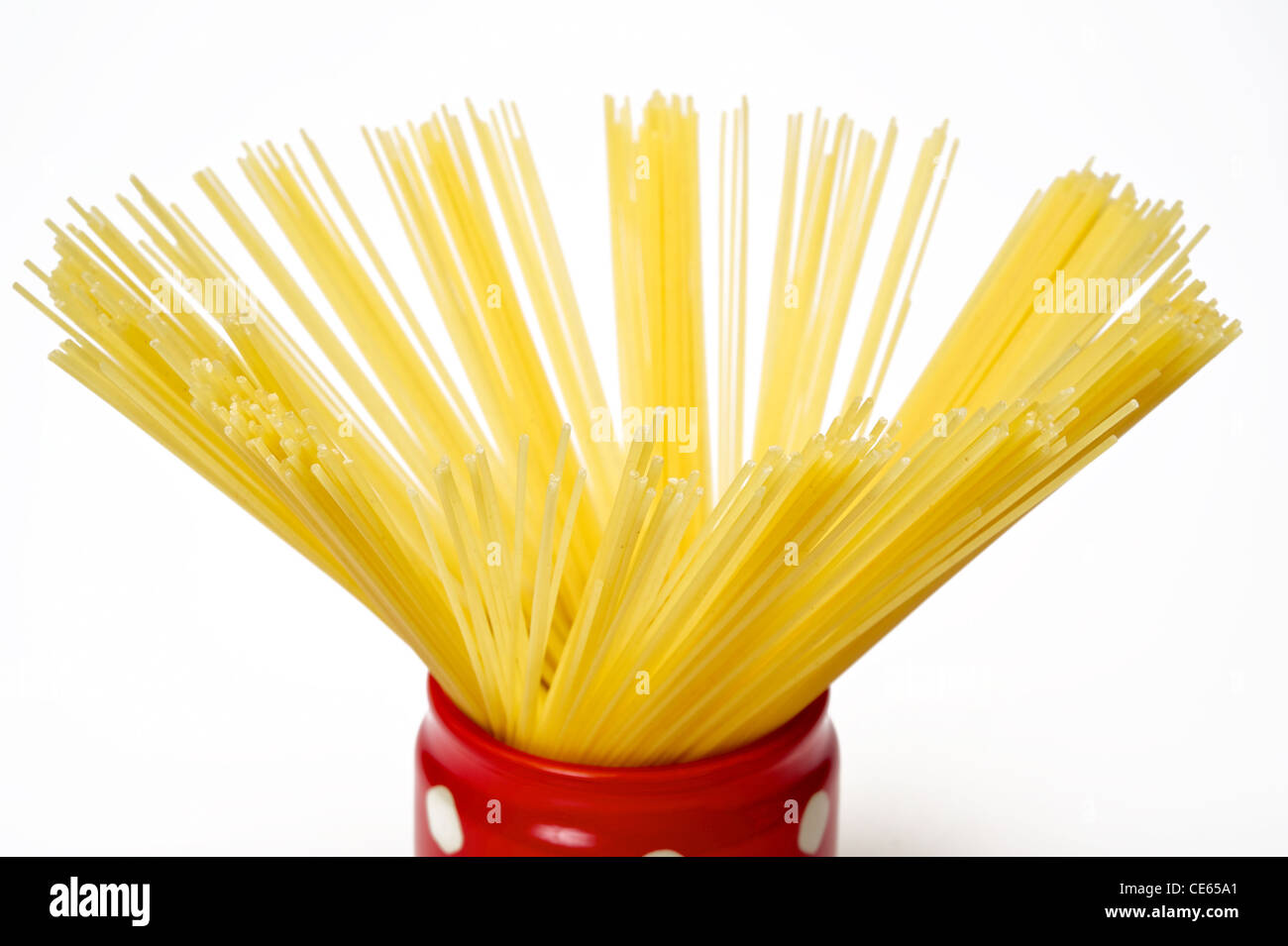 Closeup spaghetti inside a red jar isolated on white background Stock ...