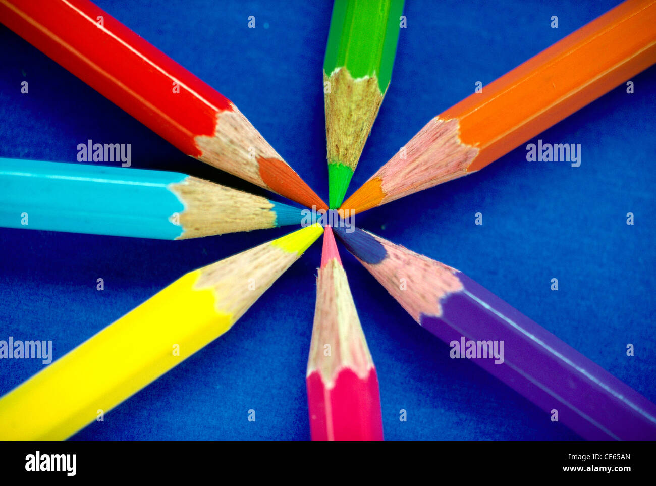 color pencil on blue background Stock Photo - Alamy