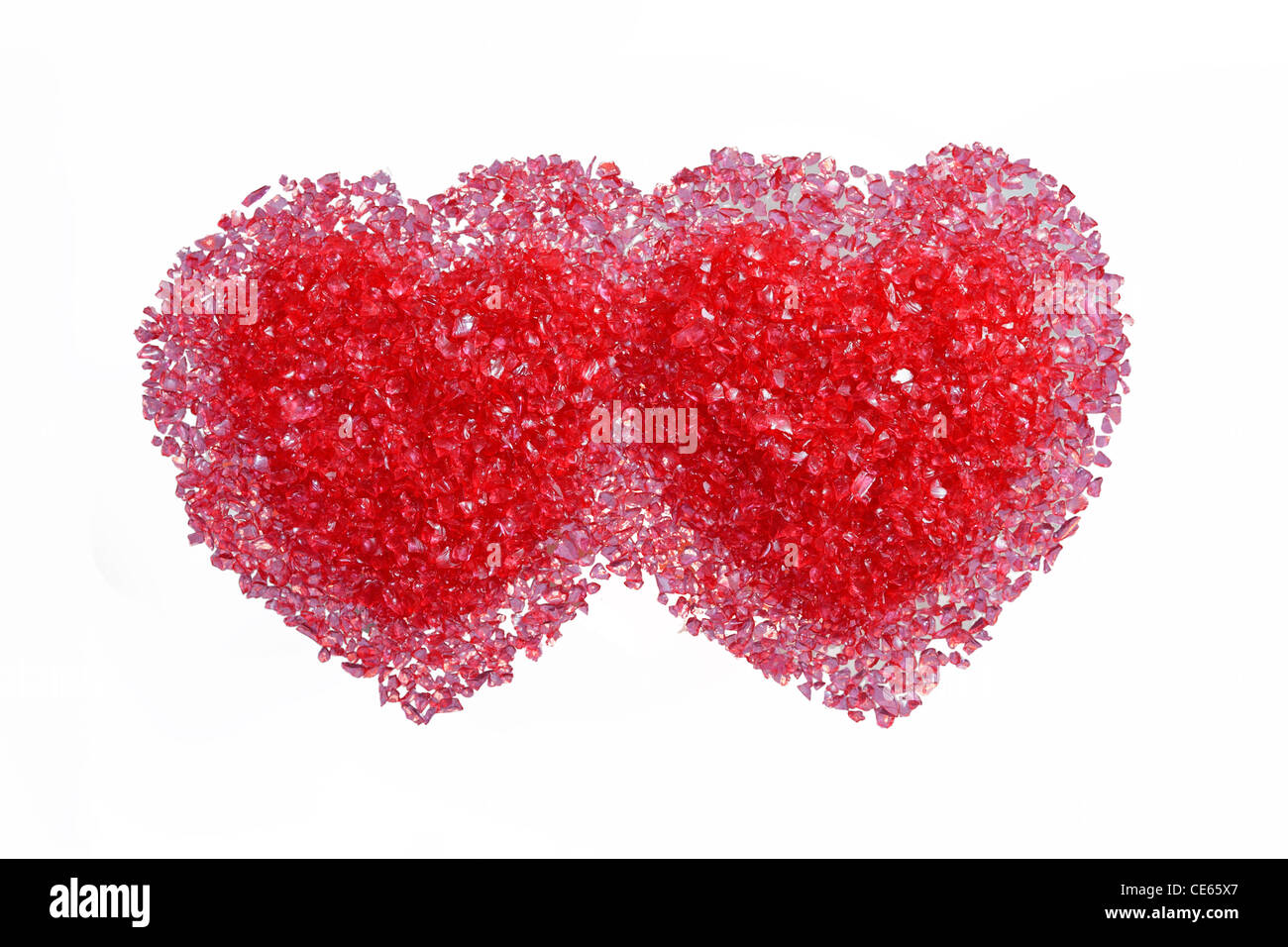 Two ruby red hearts on a white background Stock Photo - Alamy