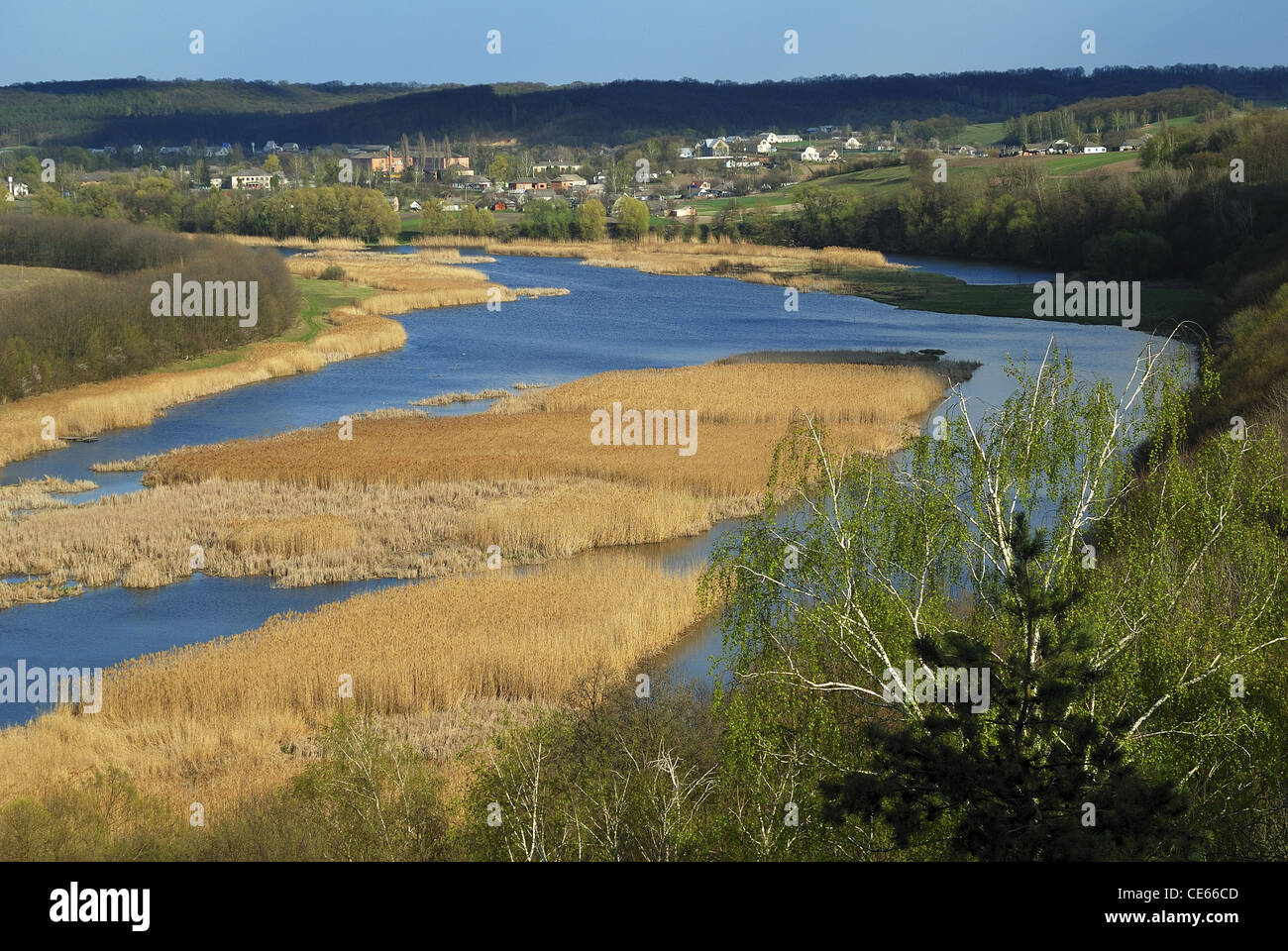 Small village riverbank at spring Stock Photo - Alamy
