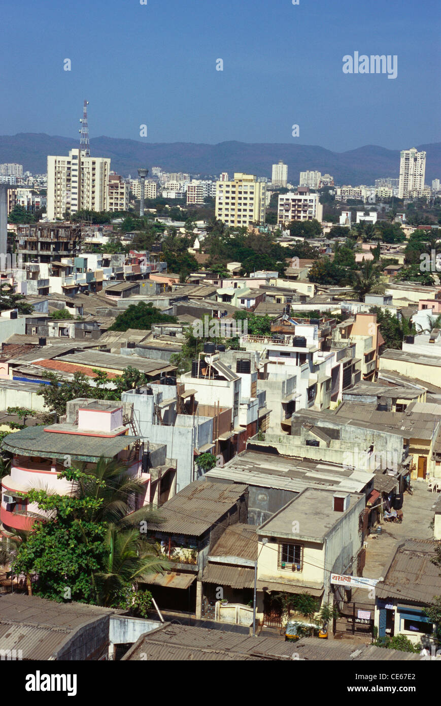 Aerial view of dense row houses & multi storied buildings ; Goral ...