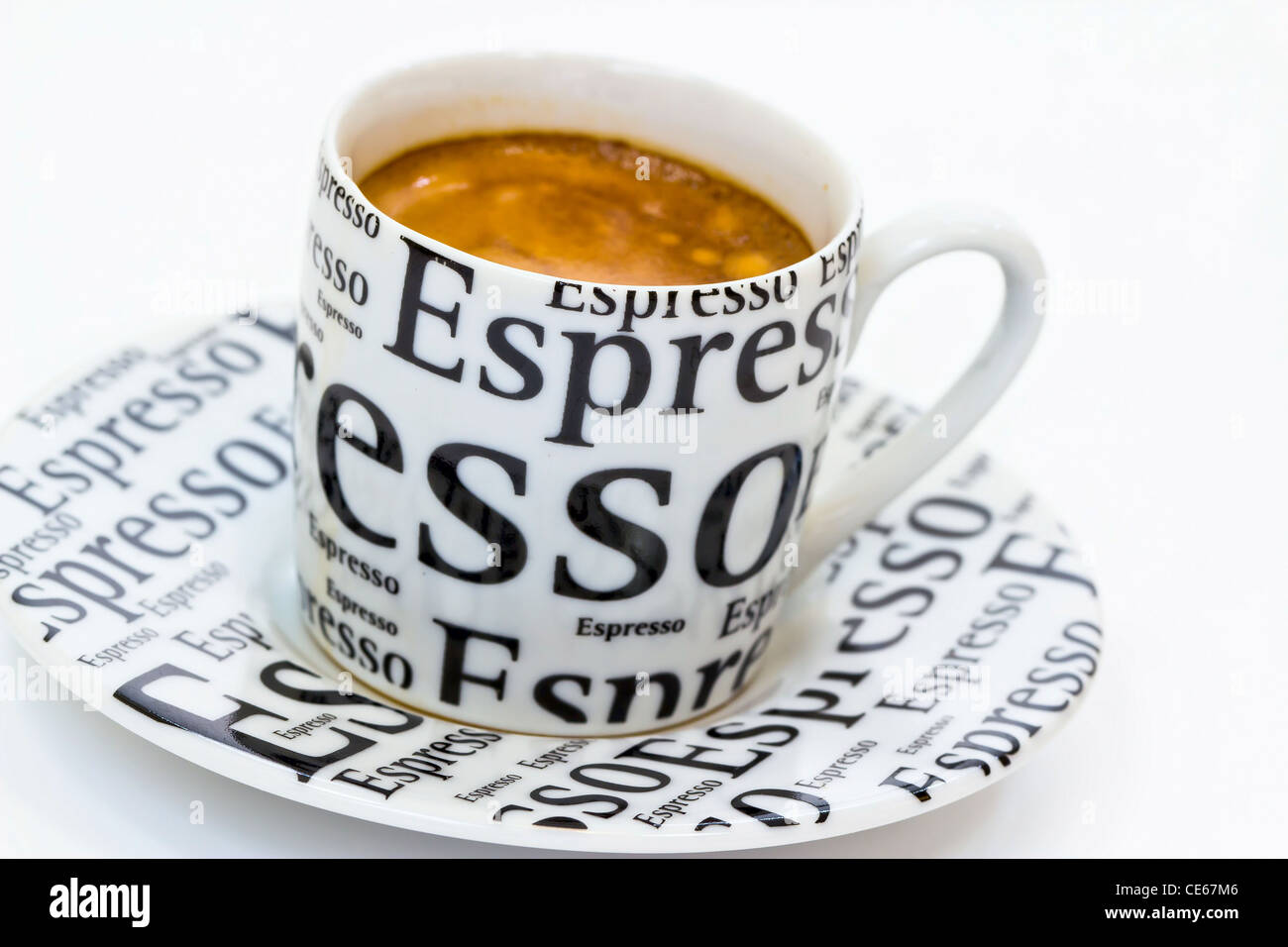 cup fresh espresso coffee with crema on a white saucer Stock Photo - Alamy