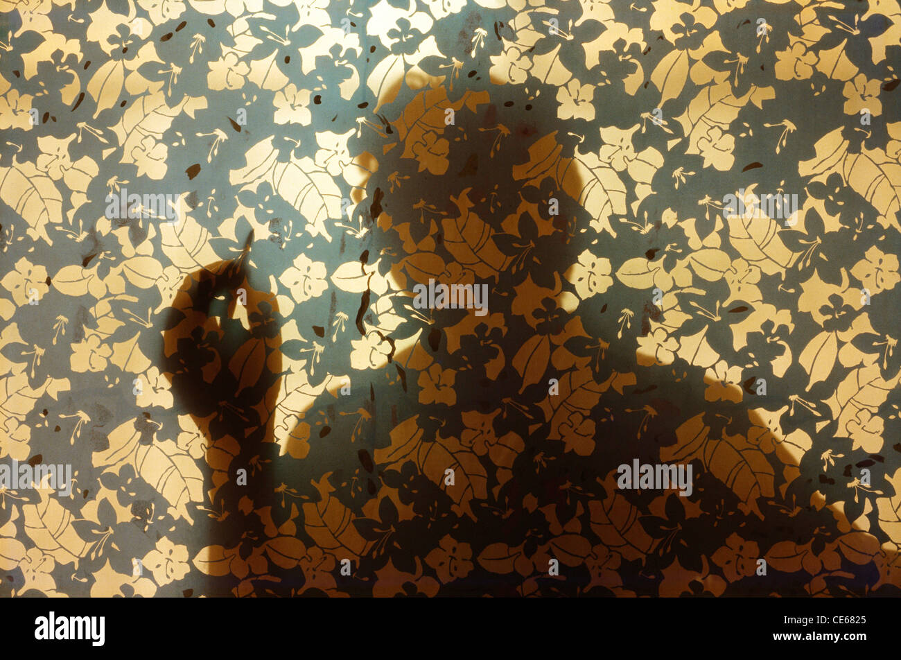 Textile designer behind cloth Stock Photo - Alamy