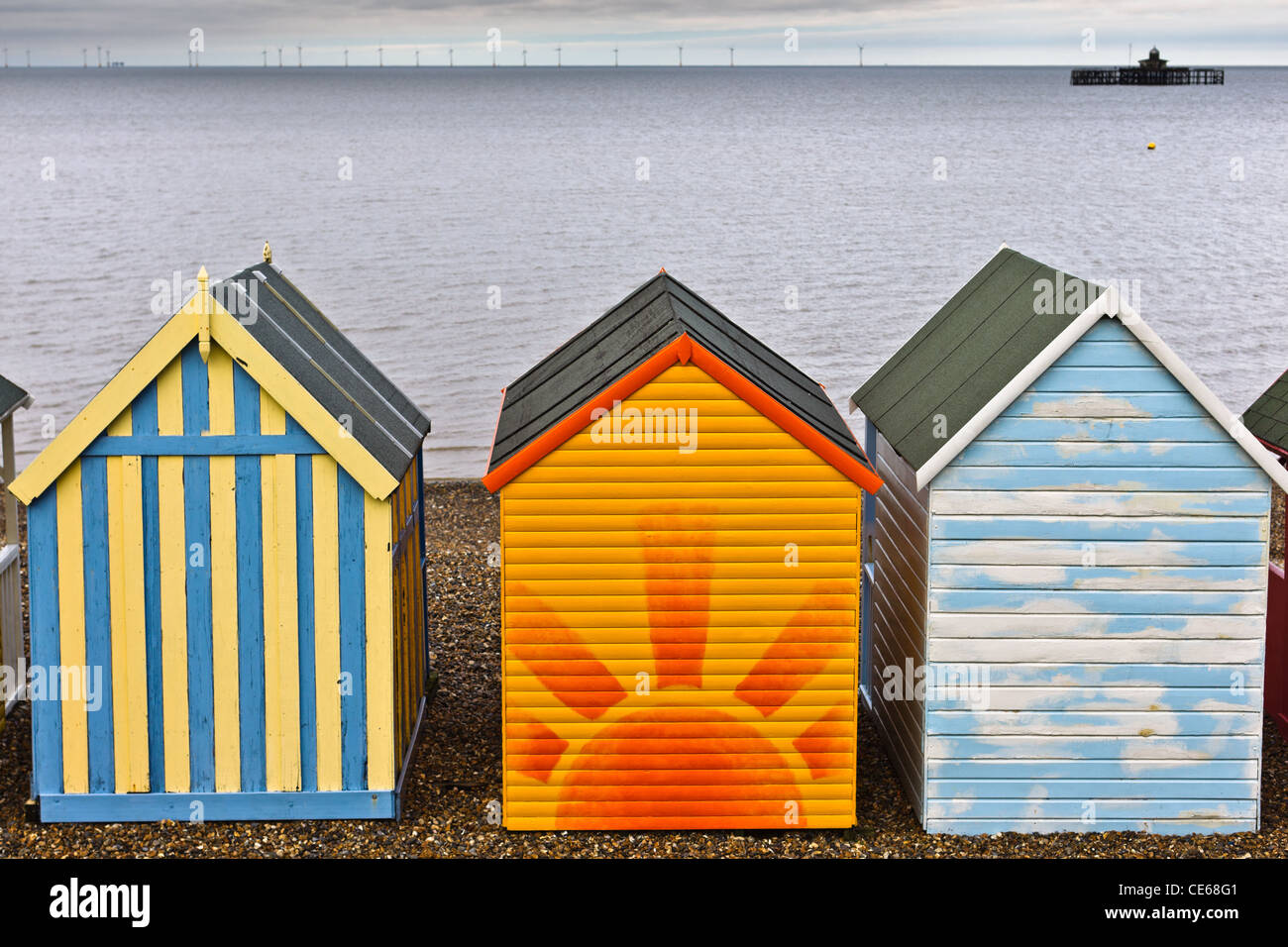 Three colourful beach huts in Herne Bay, Kent, uk Stock Photo - Alamy