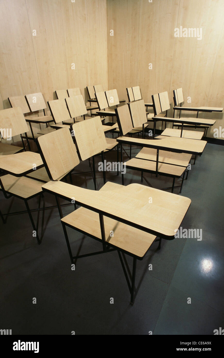eleven chairs in an empty room Stock Photo - Alamy