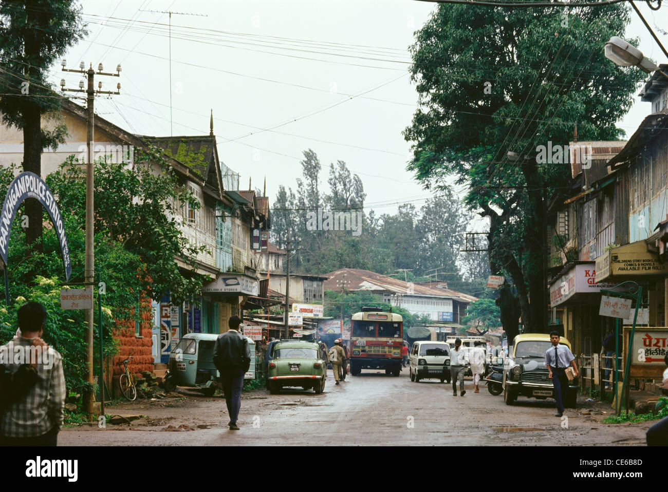 Main street of Panchgani town ; car bus taxi ; hill station ; Paachgani ...