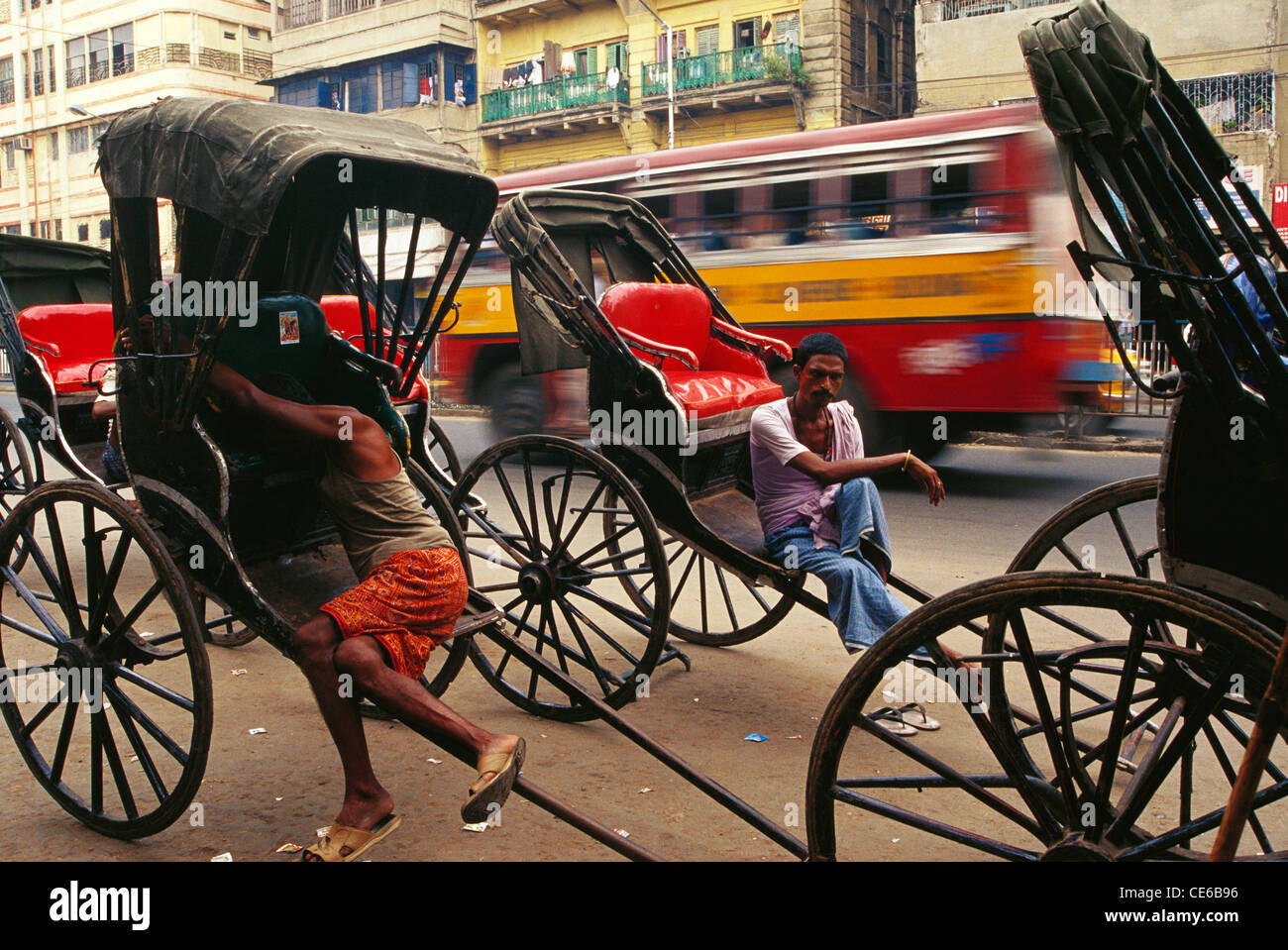 Hand pulled rickshaw pullers hi-res stock photography and images - Alamy